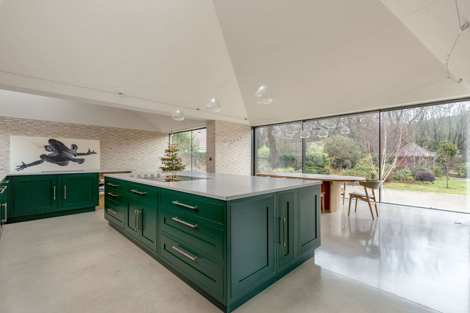 Bespoke shaker kitchen with wrap around wall unit and bar/drinks ...
