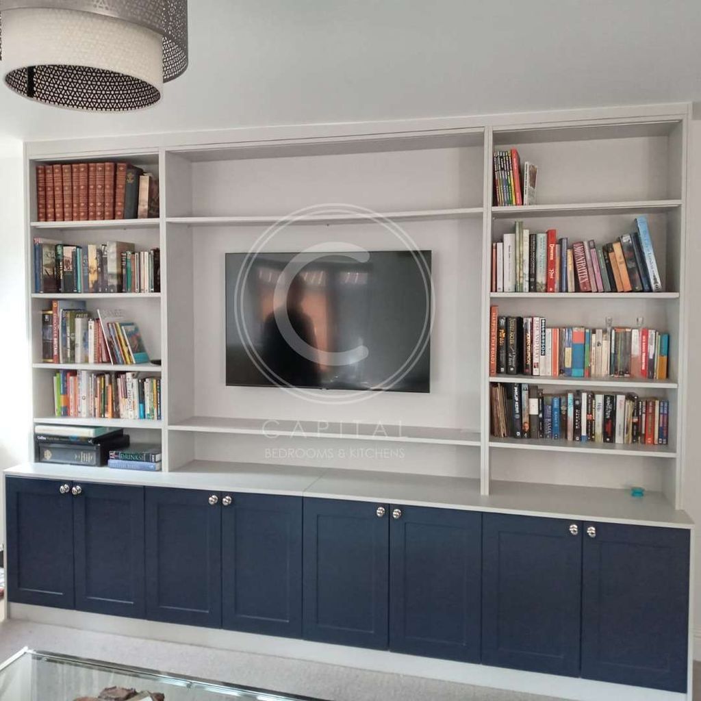 Fitted tv unit with built-in bookshelf , capital bedrooms | homify