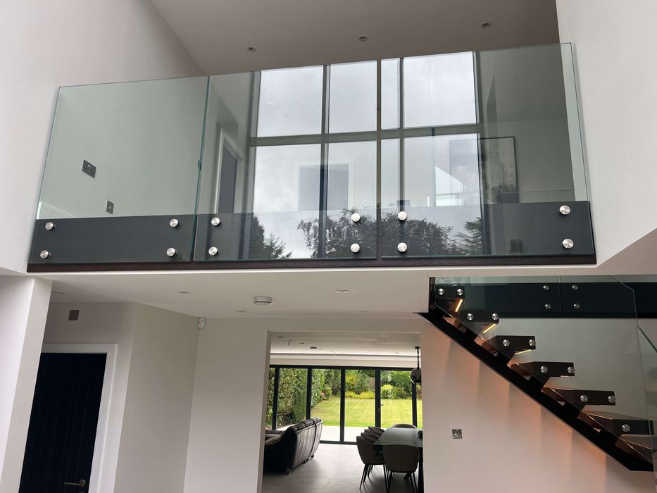 Modern floating staircase with european oak, glass balustrades, and ...